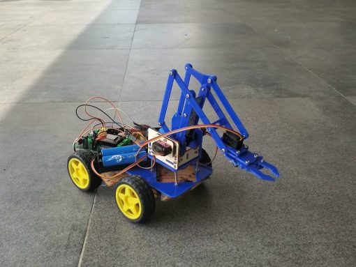 ESP32-Based Robotic Arm Car Controlled with PS3 Bluetooth